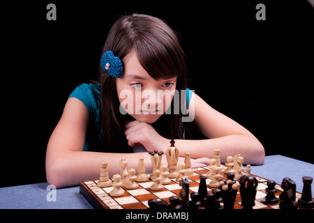 Chess player deep in thought Stock Photo - Alamy