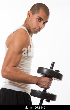 Fit muscular Latino sports man doing bicep curl exercise with ...