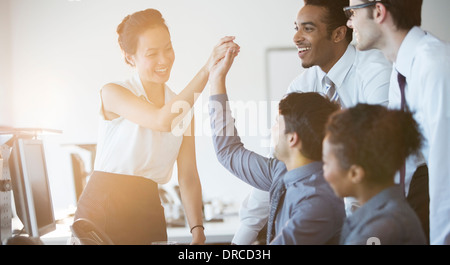Business people cheering Stock Photo - Alamy