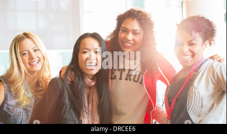 Smiling students looking at the camera Stock Photo - Alamy