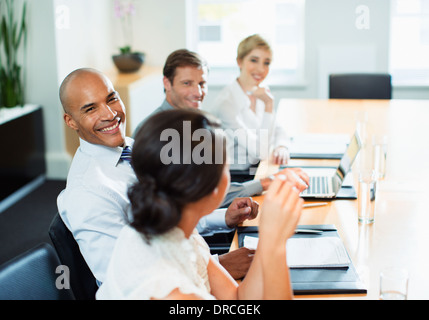 Business people sitting in meeting Stock Photo - Alamy