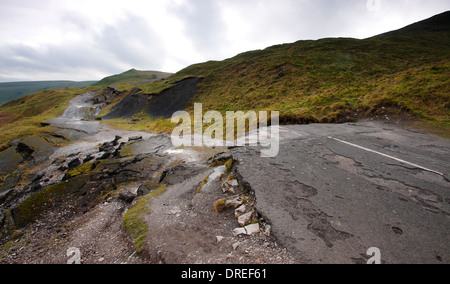 Undulations on a now defunct road on Mam Tor's eastern face caused by a ...