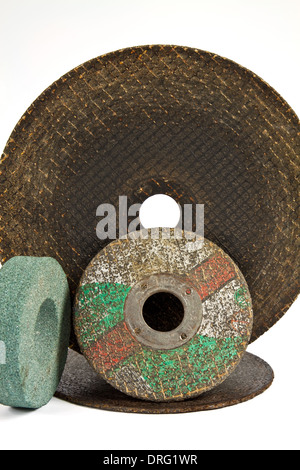 Different sizes used discs and emery grinder Stock Photo - Alamy