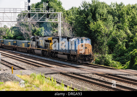 CSX Locomotives EMD SD70MAC No 4763 and GE CW44-6 No 677 on intermodal freight duty passing ...