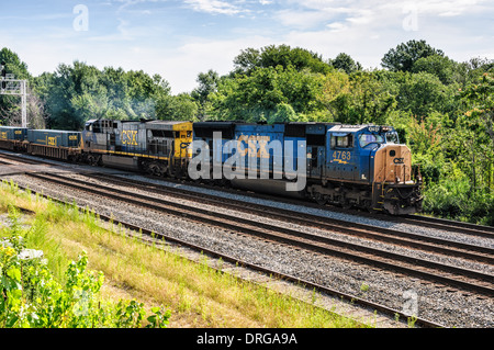 CSX Locomotives EMD SD70MAC No 4763 and GE CW44-6 No 677 on intermodal freight duty passing ...
