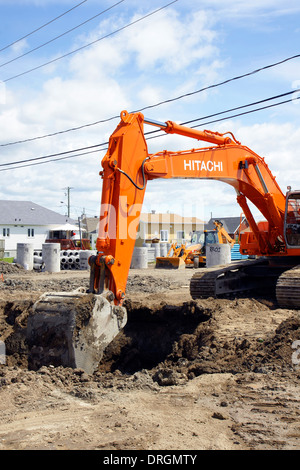 New Hitachi mechanical digger at work Stock Photo - Alamy