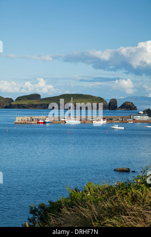 Boats moored beside Teelin Pier, County Donegal, Ireland Stock Photo ...