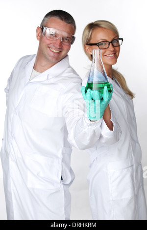 researchers holding a secret green chemical substance Stock Photo - Alamy