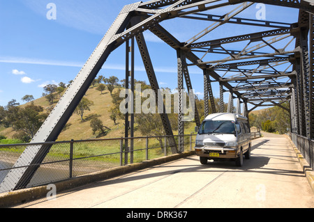 Toyota Hiace campervan going over a bridge over the Goodradigbee River ...