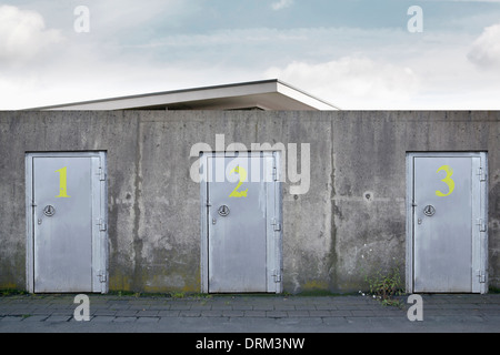 Building behind a concrete wall, composing Stock Photo - Alamy
