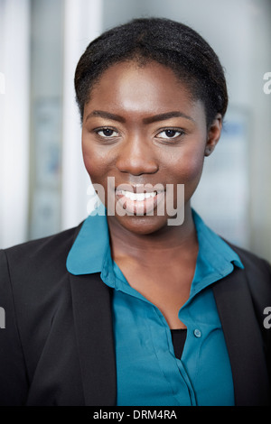 Germany, Neuss, Young Afro-european business woman using laptop Stock ...