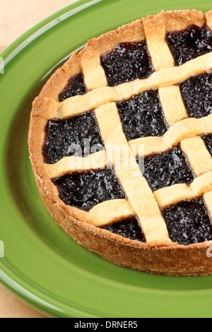 Homemade cherry jam tart on the wooden table Stock Photo - Alamy