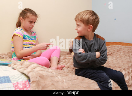 Brother & Sister Fighting Stock Photo - Alamy