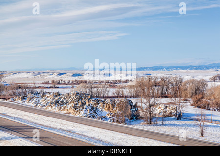 I-25 freeway in winter scenery at Natural Fort geological landmark in ...