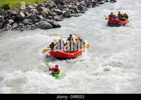 Tourists white water rafting towards Interlaken in the Bernese Oberland ...