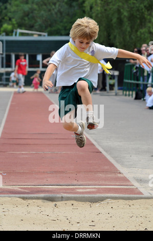 A child tries out long jump Stock Photo - Alamy