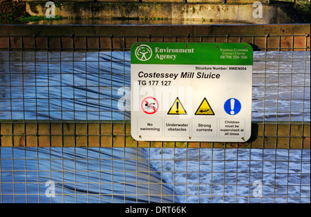 Environment Agency hazard warning sign on seawall at Reculver Herne Bay ...