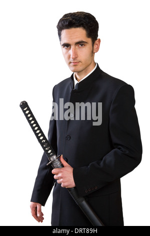 Warrior man posing with a sword isolated on black background. Close up ...