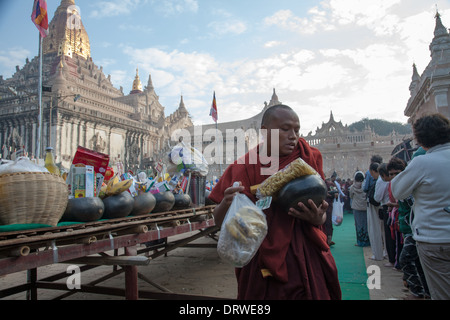 Monks receiving alms during The Ananda Festival Bagan, Myanmar (Burma ...