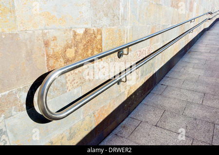 metal railings on a slope of pedestrian walkway Stock Photo - Alamy