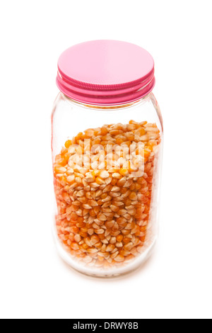 Jar of popcorn kernels isolated on a white studio background Stock ...