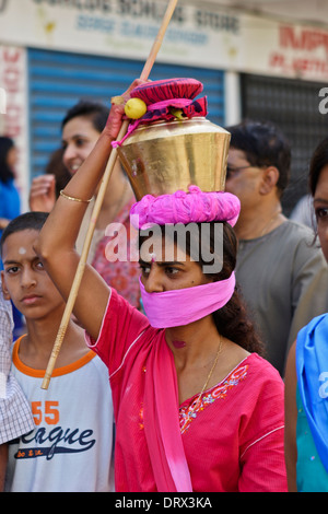 A female devotee of Lord Muruga carrying the Cavadee, Mauritius Stock ...