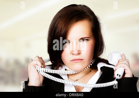 portairt of woman with telephone cord wrapped around face Stock Photo ...