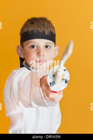 Little karate fighter. Kid boy practicing karate outdoor. Sport karate ...