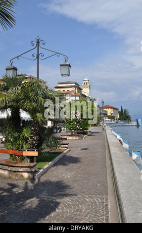 The lakeside promenade at Gardone Riviera, on Lake Garda Stock Photo ...