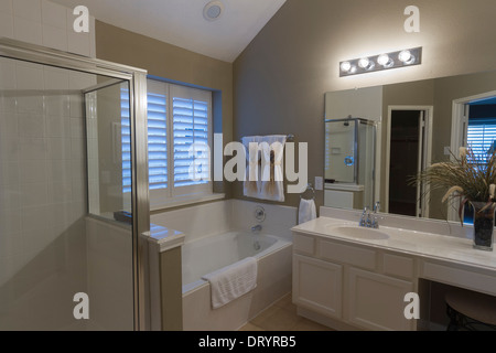 Master bathroom in mid size home in suburban neighborhood Stock Photo ...