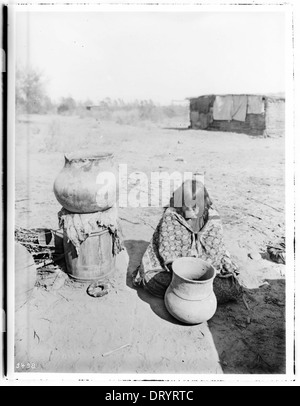 Indian women making pottery Stock Photo - Alamy
