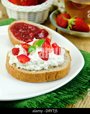 Homemade curd dessert. Fruit tea, fresh strawberries, mint leaves and ...
