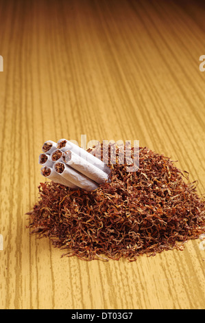 Hand rolled tobacco cigarettes on white background Stock Photo - Alamy