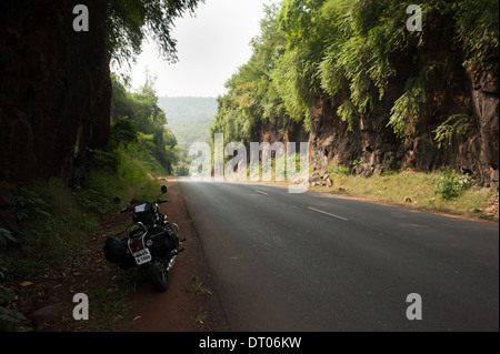 Royal Enfield on NH 17 Mumbai Goa road in morning fog Stock Photo - Alamy