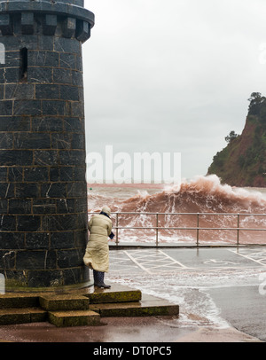 Storm on sea, high waves in old fisherman's harbour with lighthouse in ...