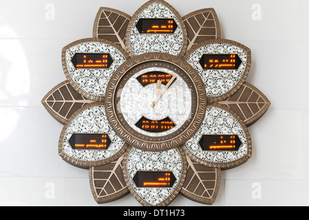 Sheikh Zayed Grand Mosque. Clocks indicating prayer times Stock Photo ...