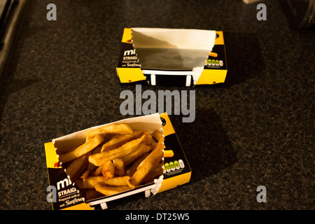 Microwave potato chips frozen fries boxes box Stock Photo - Alamy