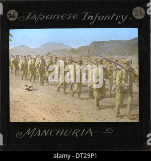 A historical photograph showing Japanese troops and civilians waiting ...