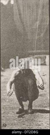 A man dressed in a pelvis cloth is captured performing various physical ...