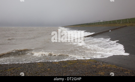 Extreme high tide at the dikes of the dutch coastal works Stock Photo ...