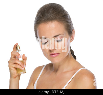 woman applying perfume Stock Photo - Alamy