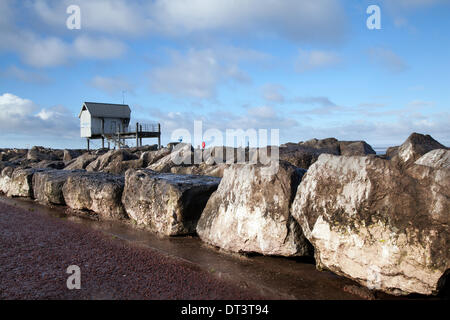 Sea wall and rock armour or rip rap defence rocks Stock Photo - Alamy