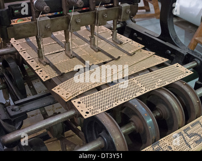 The Jacquard punched cards which control the woven pattern on an ...