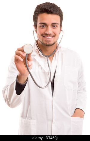 Handsome young doctor man over isolated background covering one eye ...
