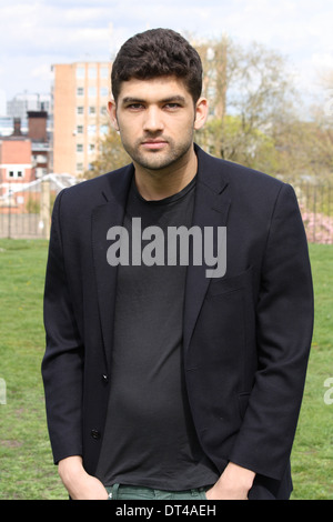 Portrait of a handsome male model posing in cool fashionable clothes ...