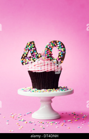 birthday cake with number 40 - cupcake on orange background with ...