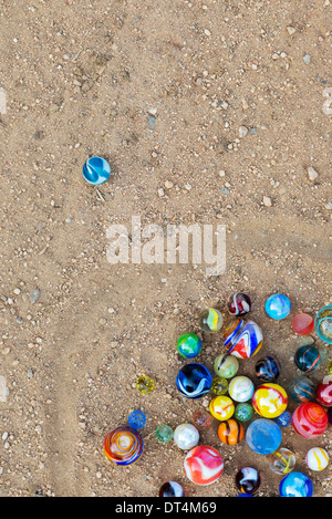Marbles in the dirt. India Stock Photo - Alamy