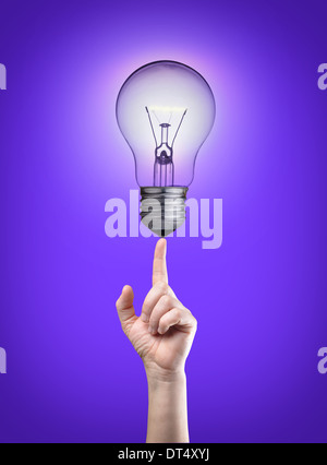 Light bulb on tip of finger Stock Photo - Alamy