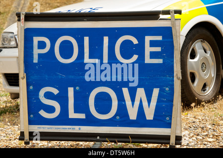 police accident temporary sign in the middle of the road at the scene ...