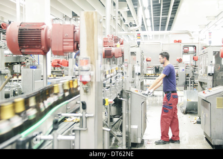 Man working on the production line of the Audi A3 at the Audi plant ...